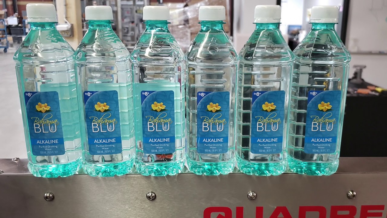 Efficient Labeling Solution for Square Water Bottles: TechLine's Front ...