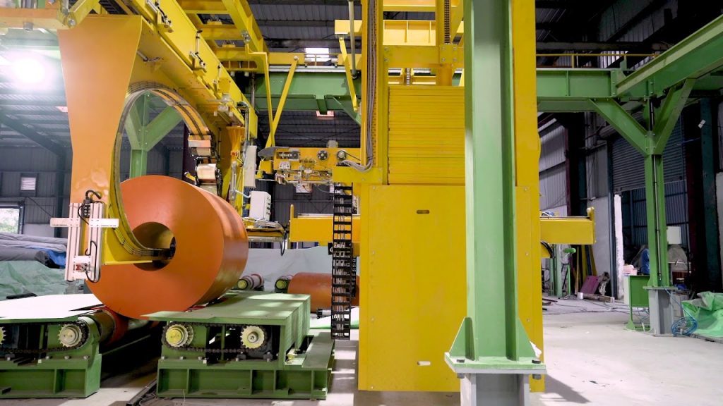 Coil Wrapping Machine with Plastic Edge Protector - Bag packing and ...