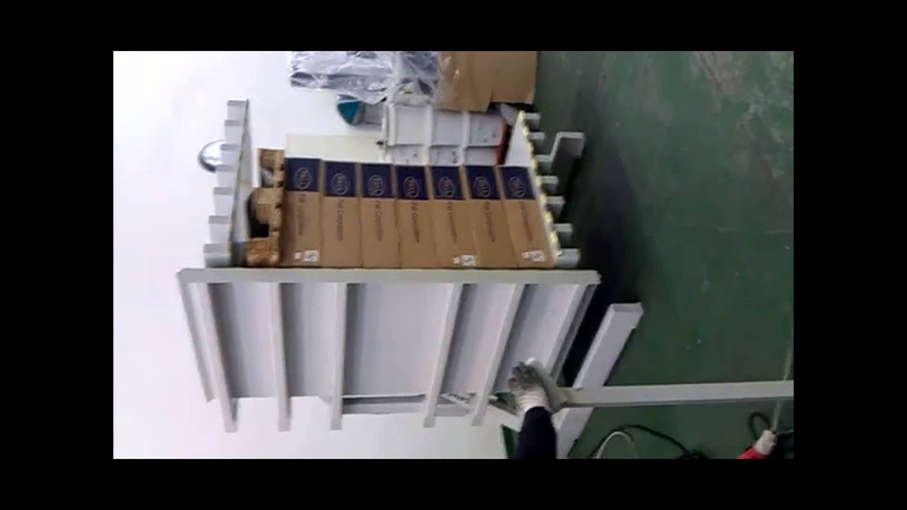 Stationary Pallet Inverter - Bag packing and packing line